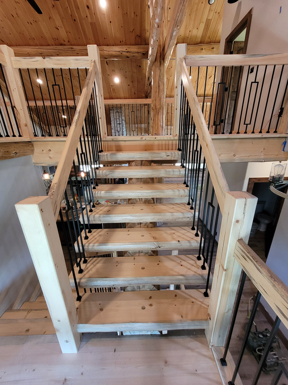 Mono-Stringer Log Stairs - split direction landing